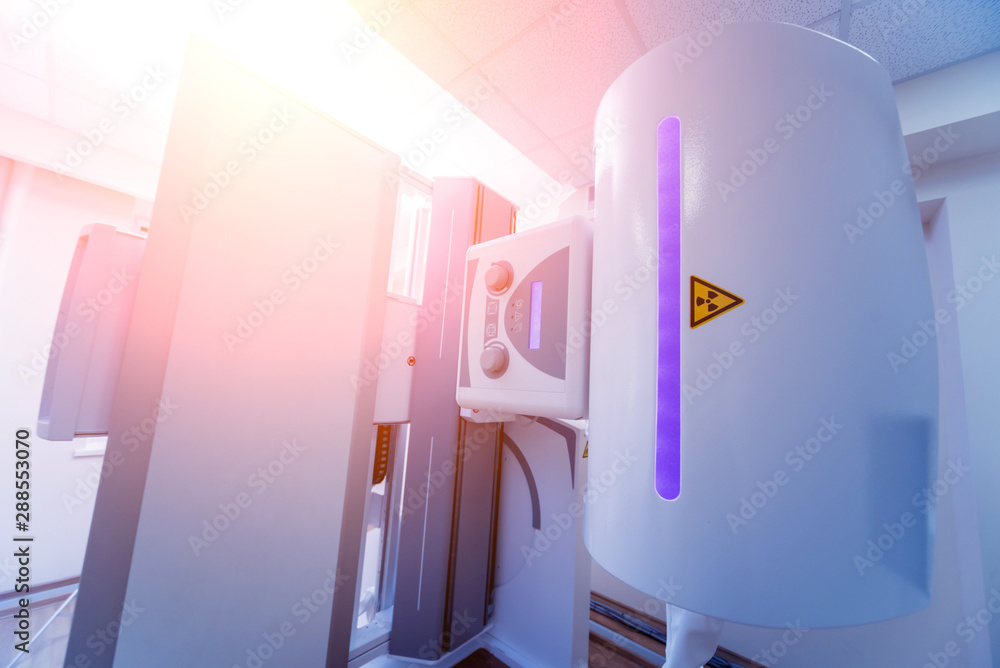 X-ray room in a hospital. Classic ceiling-mounted x-ray system. Stock ...