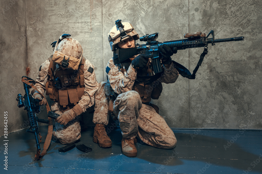 US special operations forces fighters armed with assault rifle, in ...
