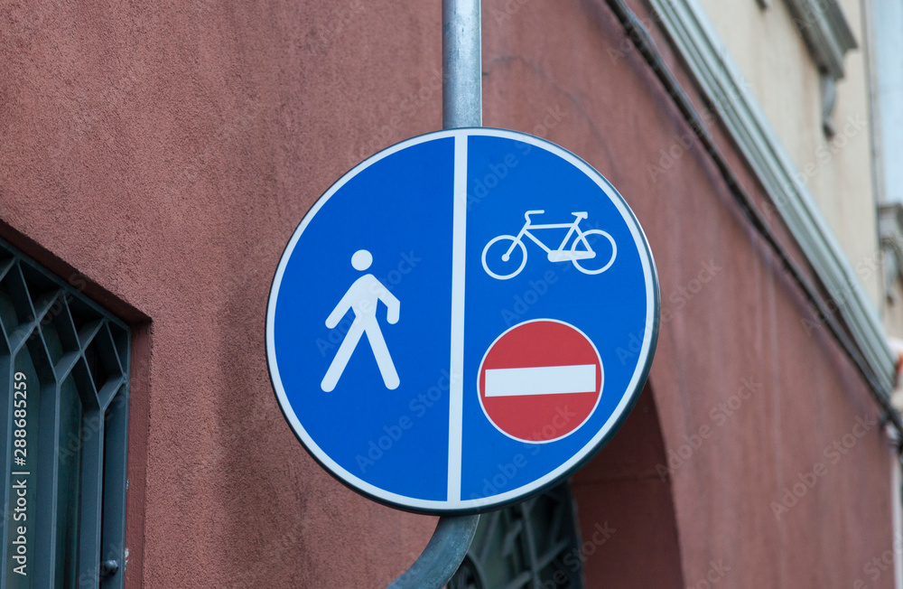 Pedestrian area and no entry bike area indicated by a circular blue ...