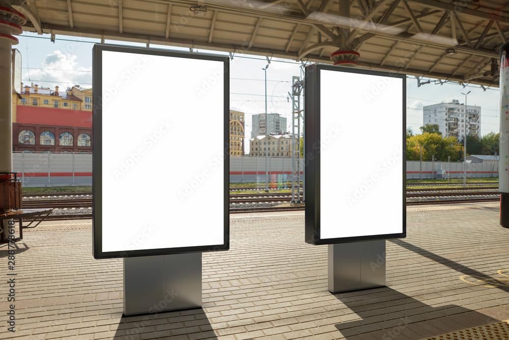 Blank billboard poster stand mock up on platform of raillway station ...