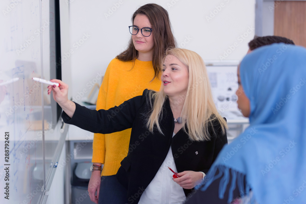 Female Architecture teacher at work. Female professor explain ...
