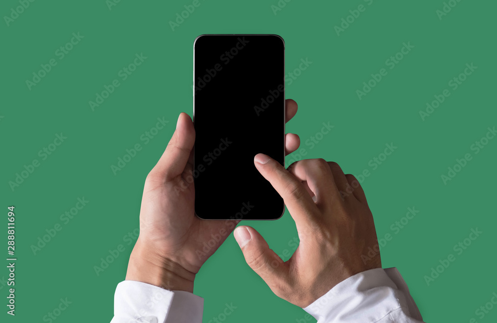 Hand holding white mobile phone with blank white screen in Sea green ...