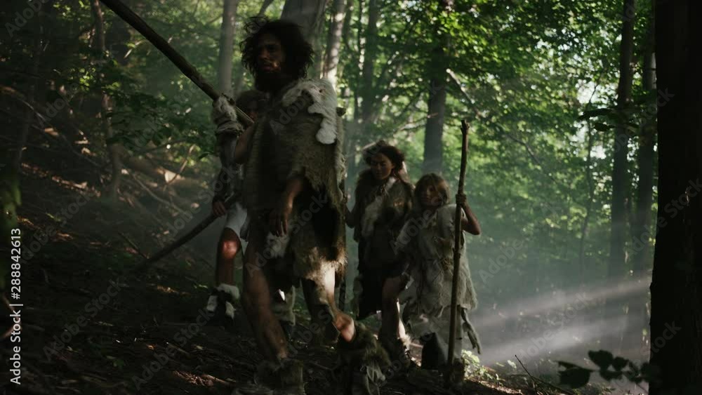 Tribe of Hunter-Gatherers Wearing Animal Skin Holding Stone Tipped ...