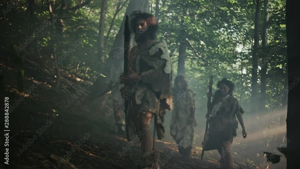 Tribe of Hunter-Gatherers Wearing Animal Skin Holding Stone Tipped ...