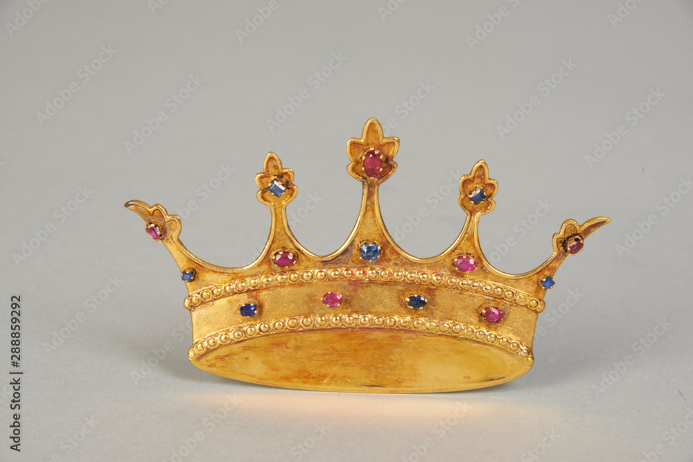 gold crown on grey background Stock Photo | Adobe Stock