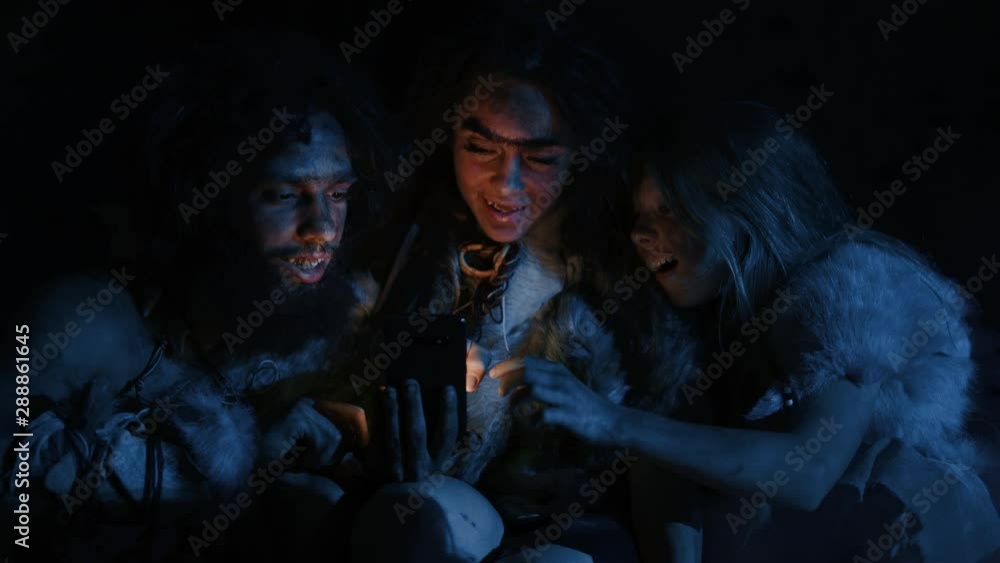 Tribe of Prehistoric, Primitive Hunter-Gatherers Wearing Animal Skins ...