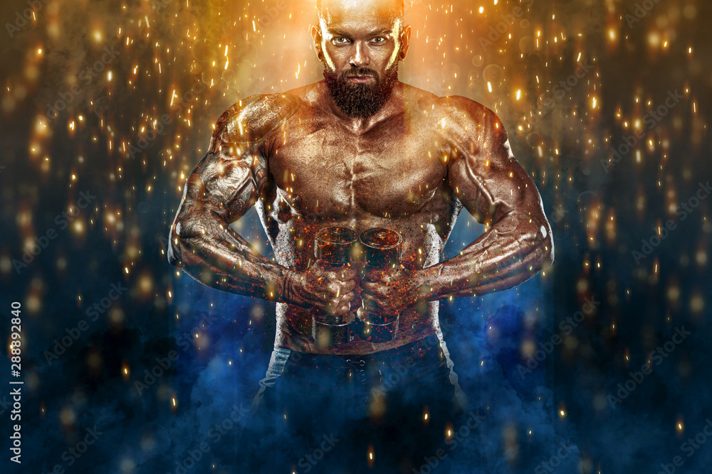 Strong and fit man bodybuilder. Sporty muscular guy with dumbbells ...