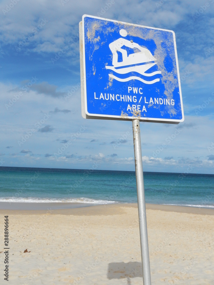 Warning sign of pwc launching landing area on Bondi Beach, Bondi ...