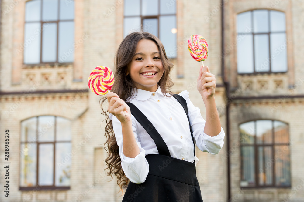 Picking flavour is hardest part. Schoolgirl choosing sweets. Happy kid ...