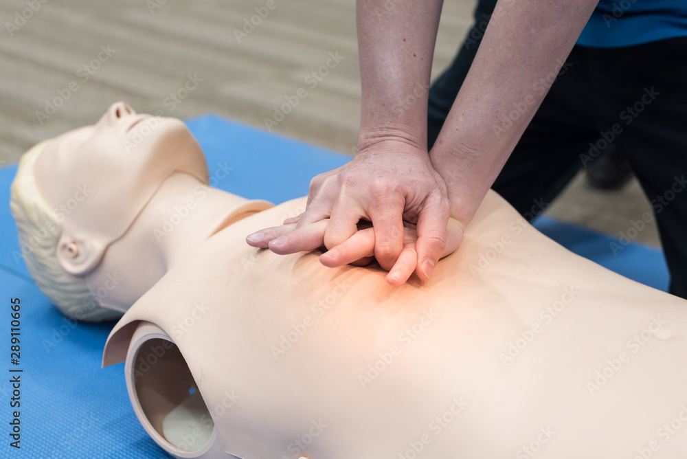 Demonstrating CPR (Cardiopulmonary resuscitation) training medical ...
