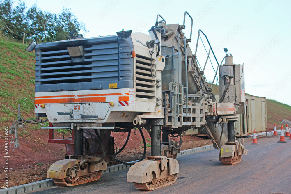 Concrete Paving machine on a road construction site Stock Photo | Adobe ...