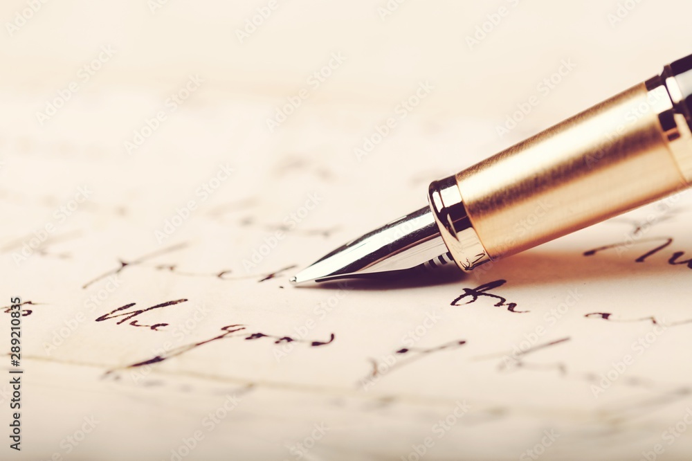 Signing a signature with a fountain pen Stock Photo | Adobe Stock