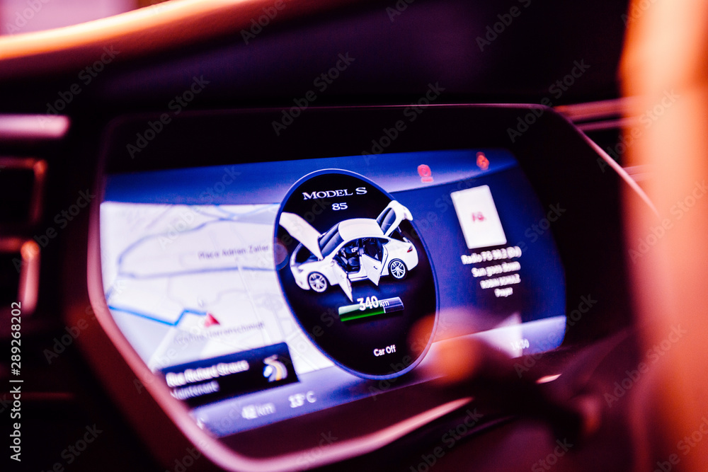 PARIS, FRANCE - NOV 29, 2014: POV New Tesla Model S dashboard computer ...