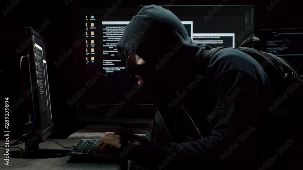 Hacker Profile Infiltrating Computer for Information Stock ビデオ | Adobe ...