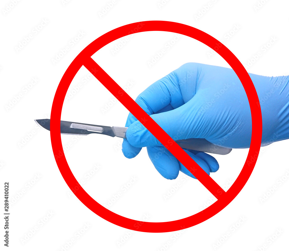 No surgery sign, Hand of surgeon in blue medical glove holding a ...