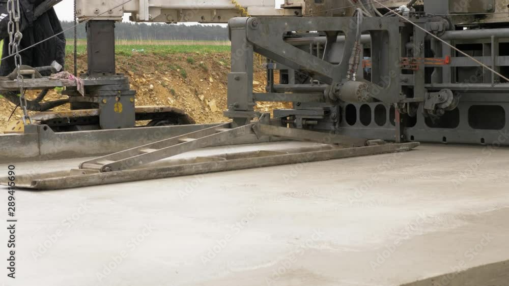 Stockvideon Fully mechanised process of concrete road construction. The ...