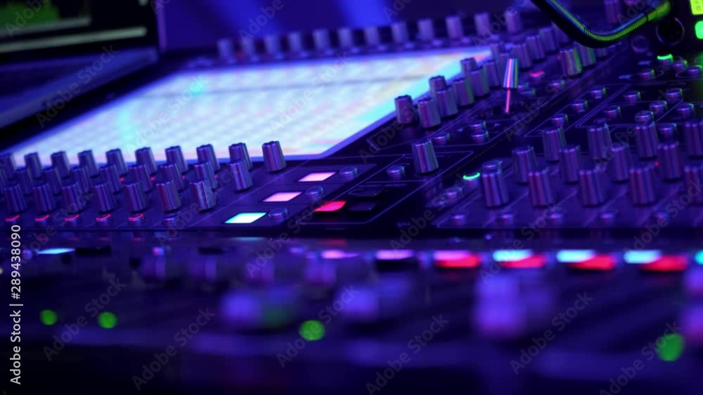 Remote control for adjusting the sound. Audio mixer. Sound engineer ...