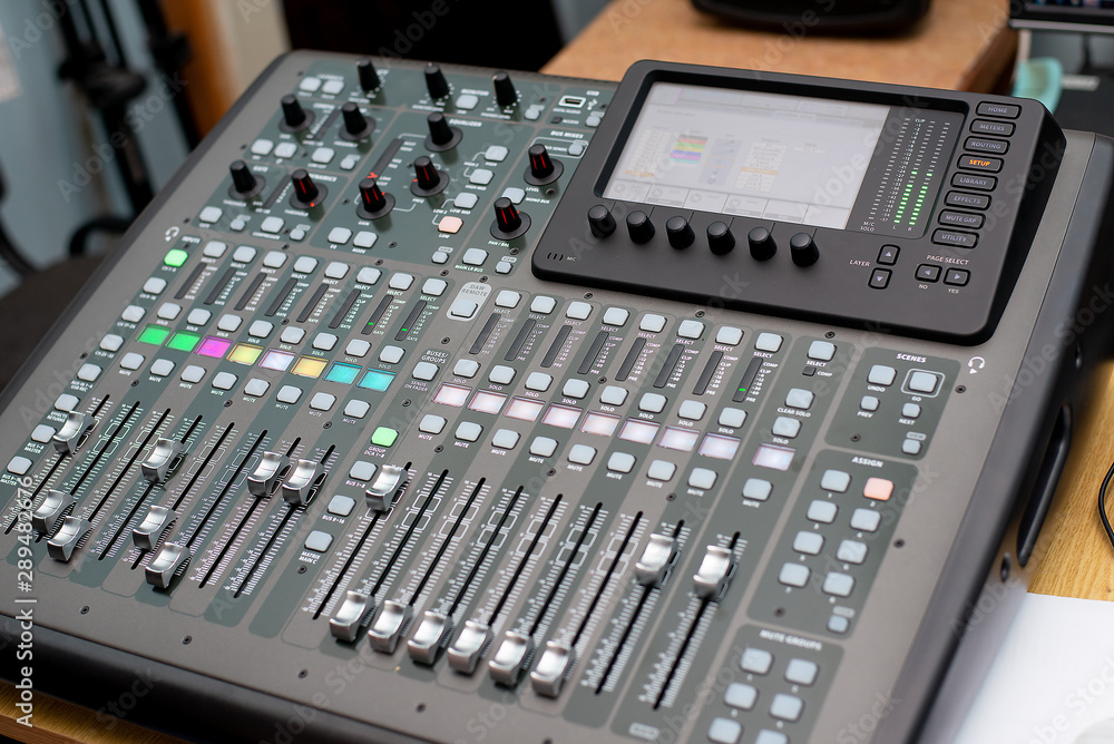 the mixer. remote for sound recording. sound engineer at work in the ...