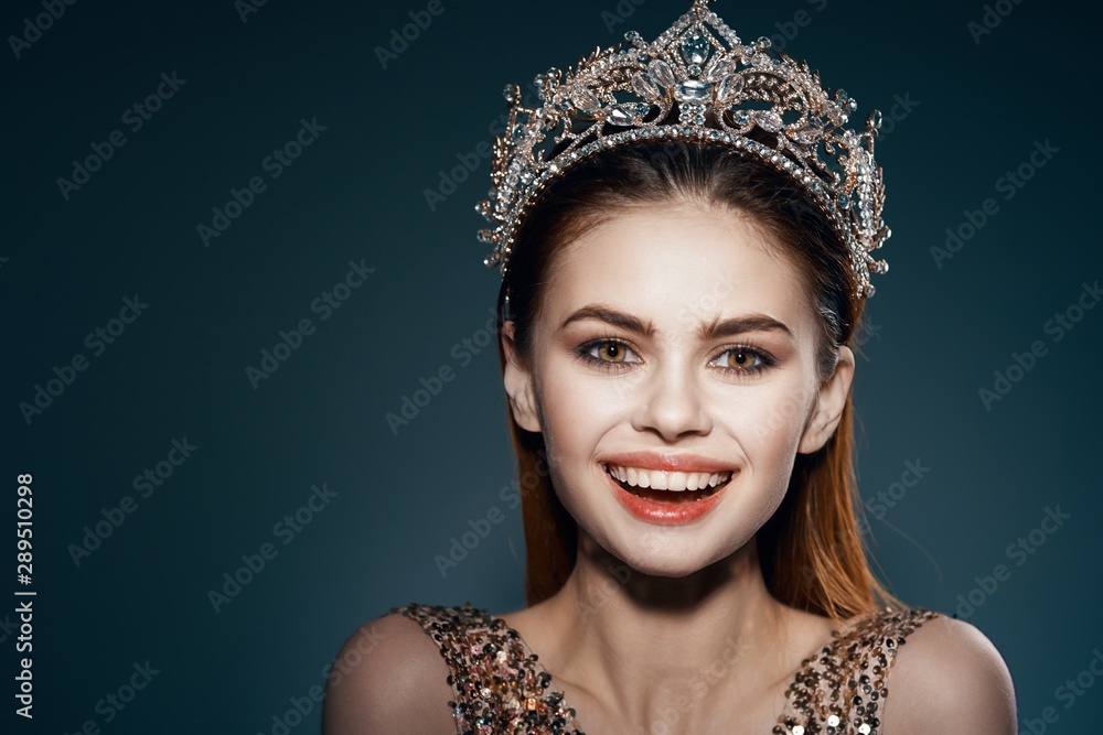 Beautiful woman with a crown on her head Stock Photo | Adobe Stock