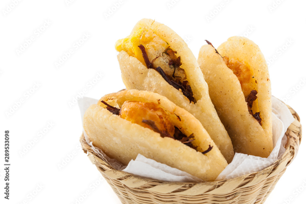Arepa de huevo. Traditional Colombian fried arepa filled with egg and ...