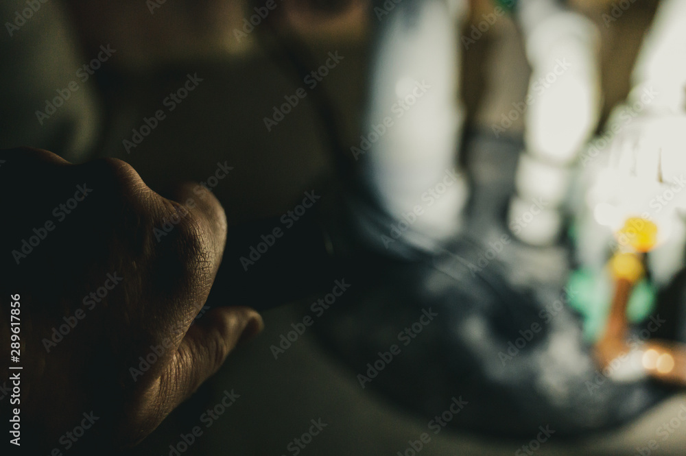 flashlight shining light on sump pump system Stock Photo | Adobe Stock