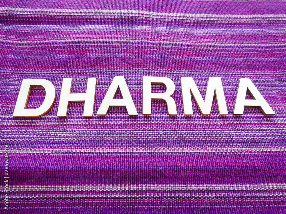 Wooden text letters with the Sanskrit word "DHARMA" for a sign, banner ...