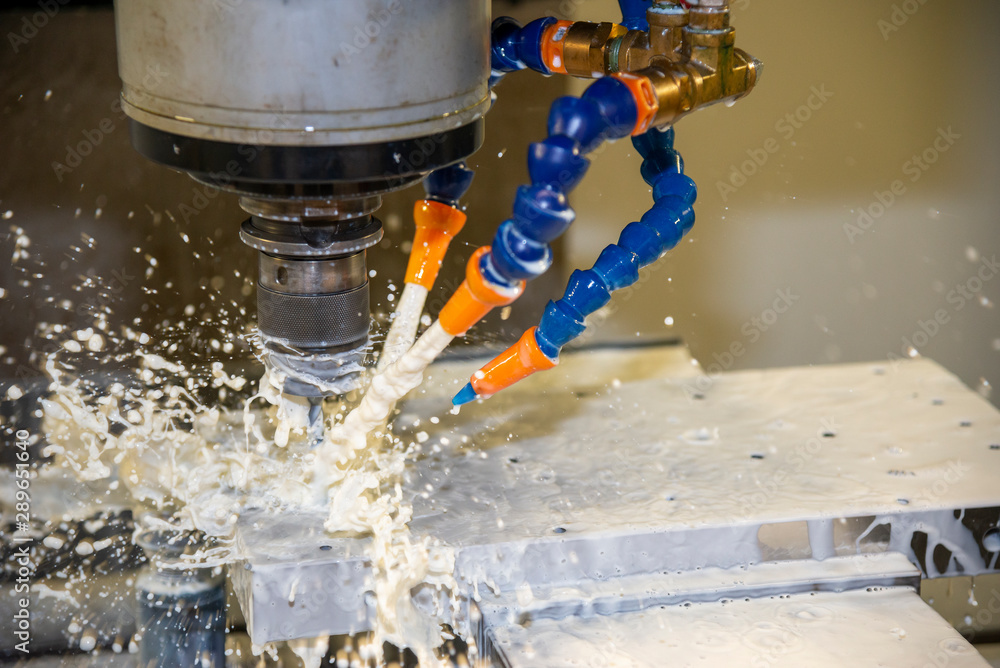 The CNC milling machine drilling the hole at mould base parts by ...