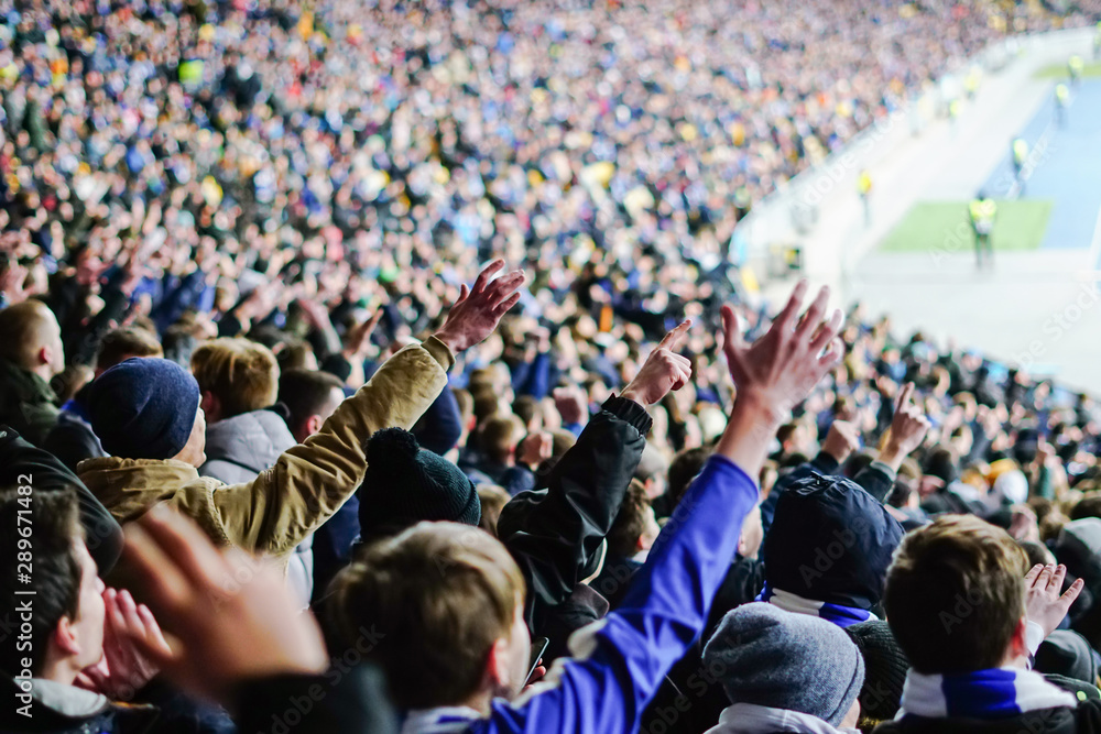 Football fans clapping on the podium of the stadium Stock Photo | Adobe ...