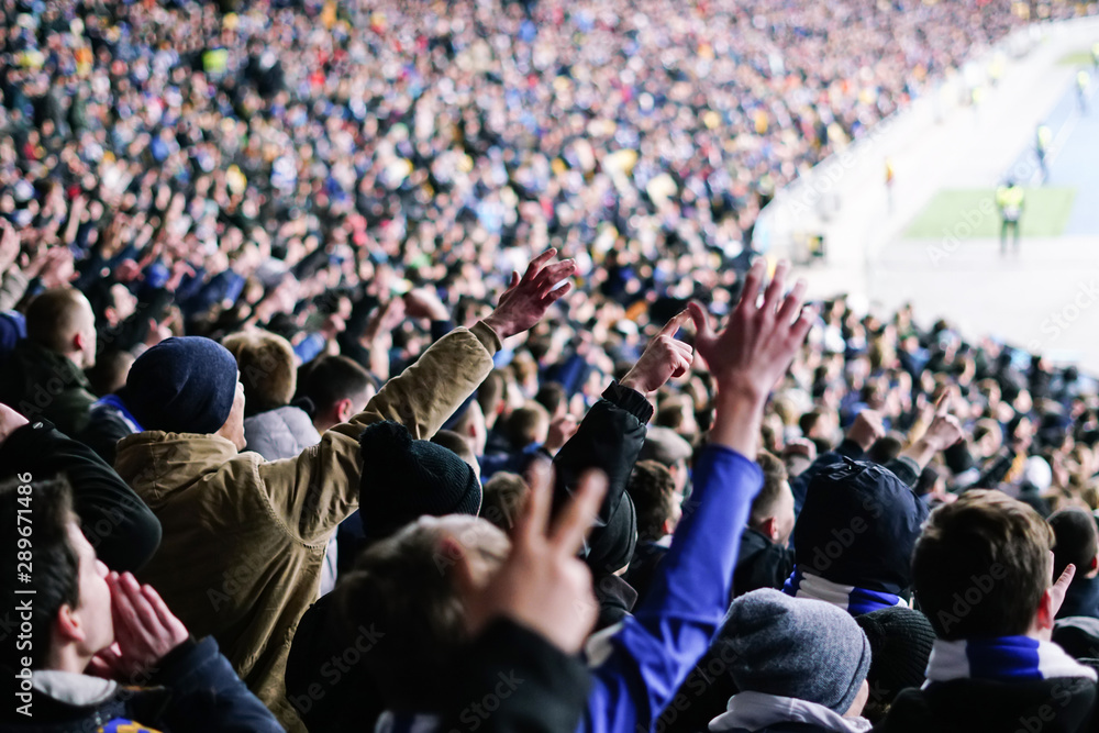Football fans clapping on the podium of the stadium Stock Photo | Adobe ...