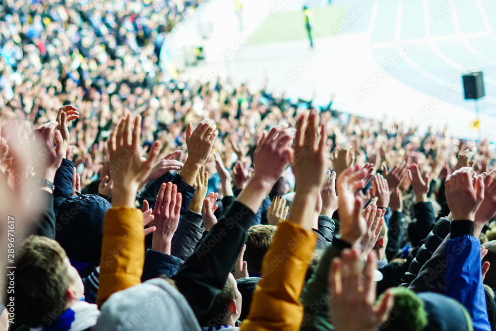 Football fans clapping on the podium of the stadium Stock Photo | Adobe ...