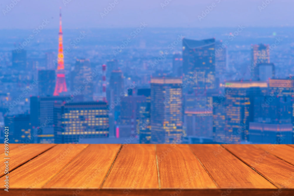Wood table top on capital city background. For display and montage ...