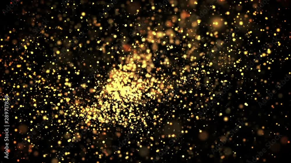 gold glowing particles flow in viscous liquid and bright glisten ...