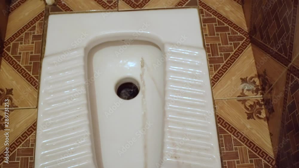 man pees in toilet, first-person view, stream of urine flies into ...