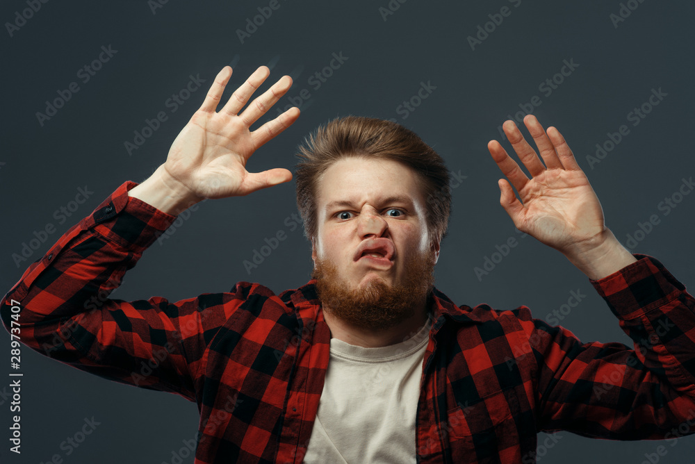 Man's funny face crushed on transparent glass Stock Photo | Adobe Stock