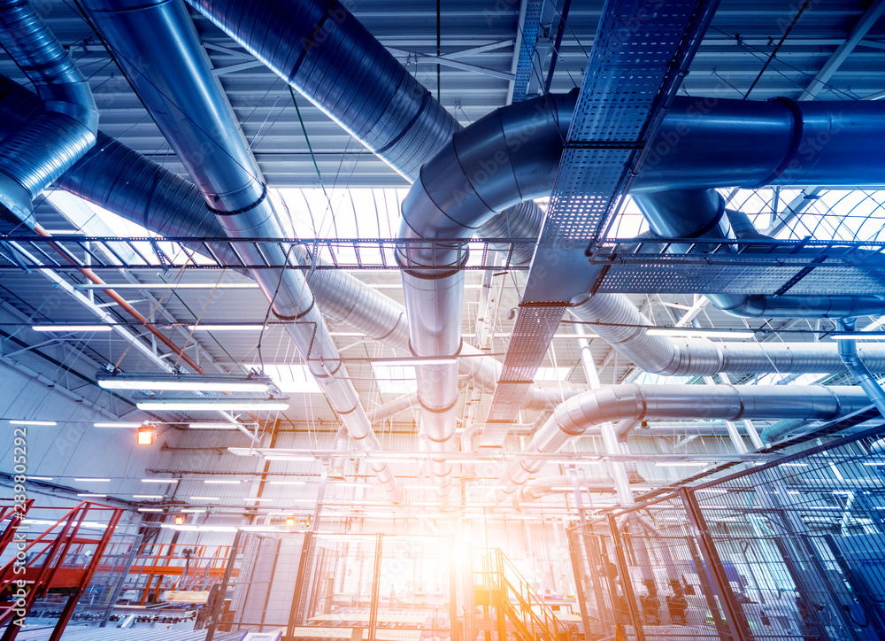 Air conditioning of buildings. Background of ventilation pipes. Laying ...