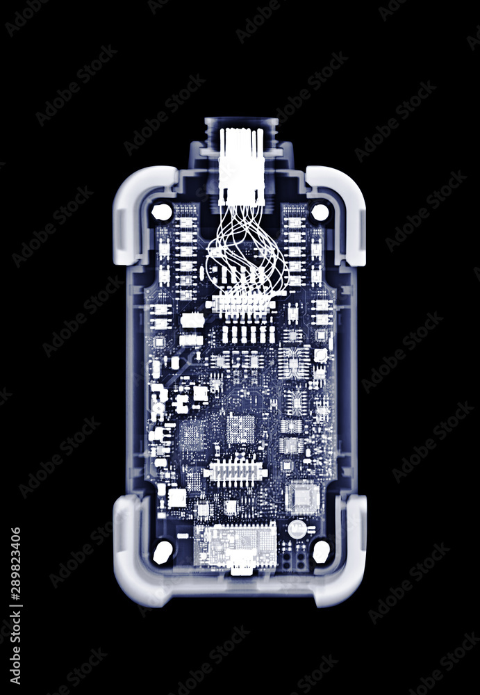 X-ray image of engine control unit or ECU in Motorcycle. CPU in ...