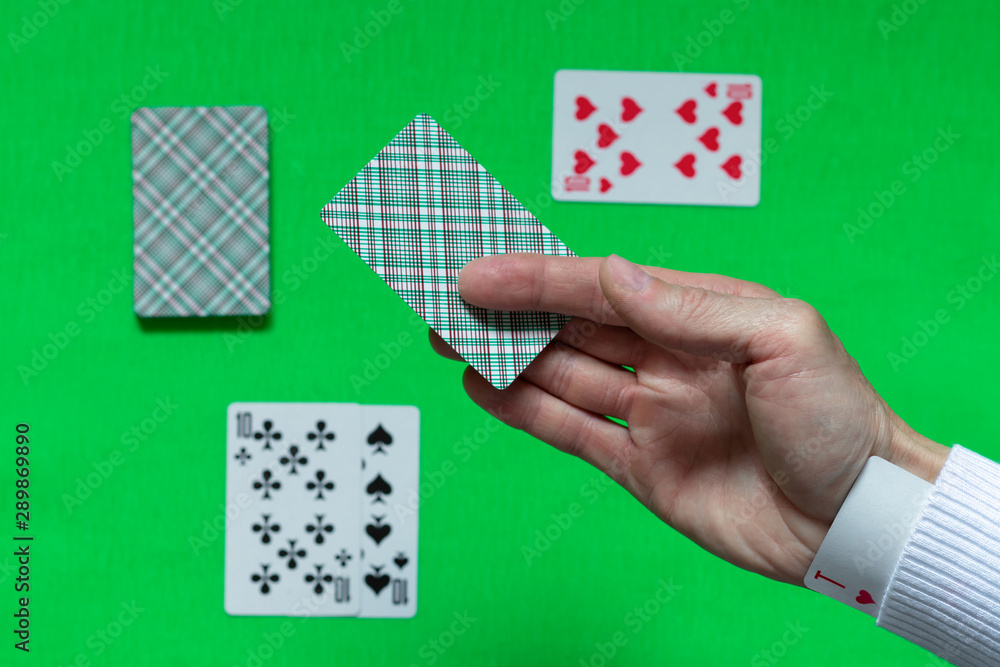 In the sleeve of the dealer producing the distribution of cards on the ...