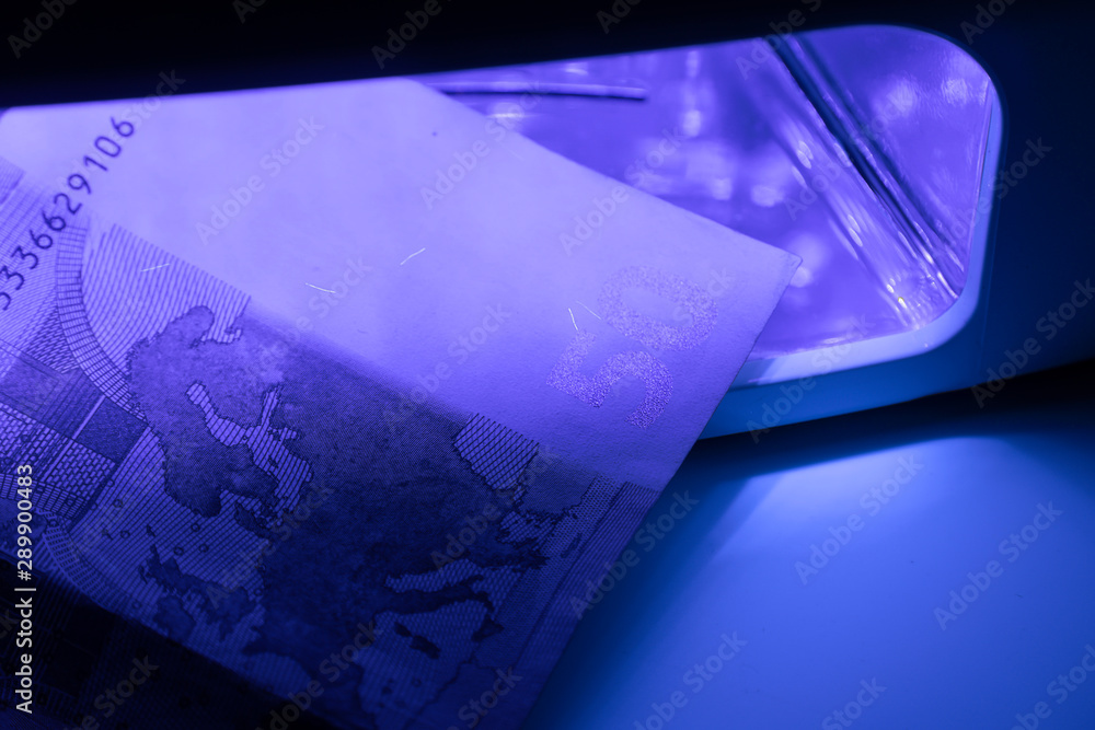 In the photo fifty euros. Banknotes of Europe. Money screening ...