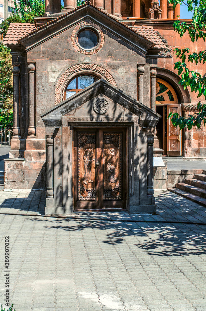 Entrance to the tomb with the relics of St.Ananias, with carved figures ...