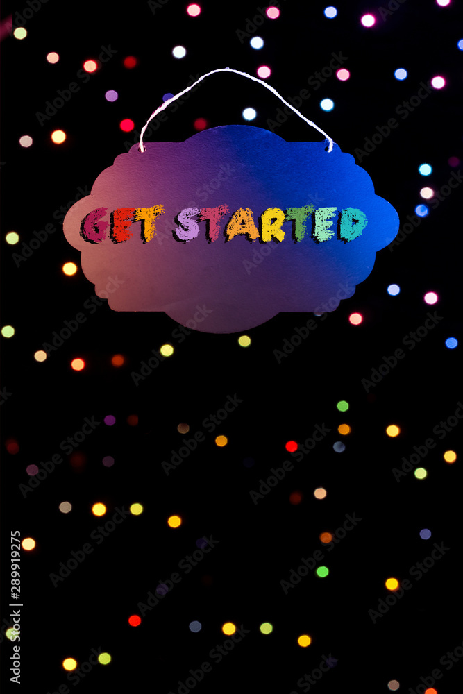 Get started wording written on blank sign board in hand Stock Photo ...