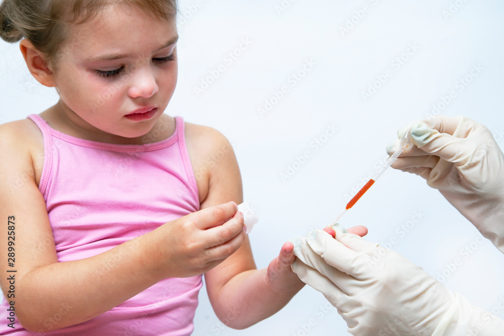 Picture of little girl having blood collection for tests Stock Photo ...