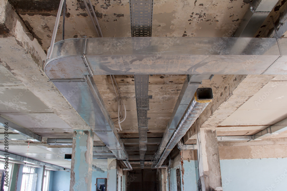 Installation of ventilation ducts during the construction of a new ...