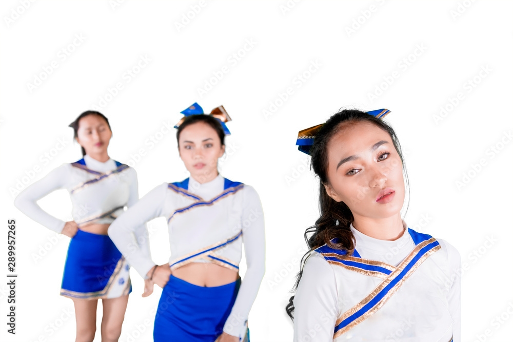 Cheerleading team standing together in the studio Stock Photo | Adobe Stock