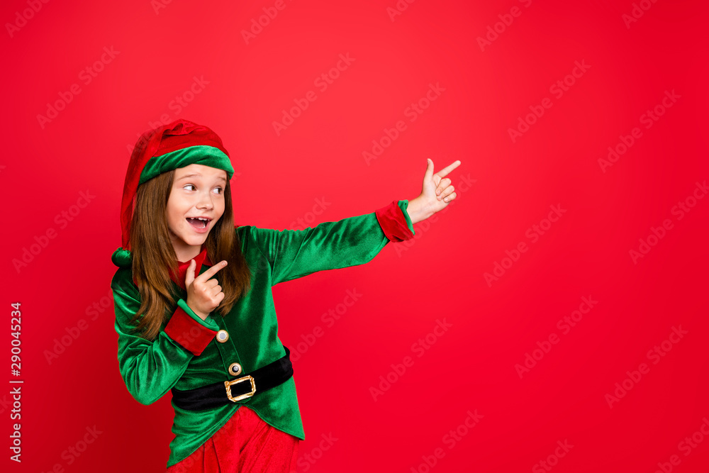 Profile side photo of cheerful redhead elf showing her index finger ...
