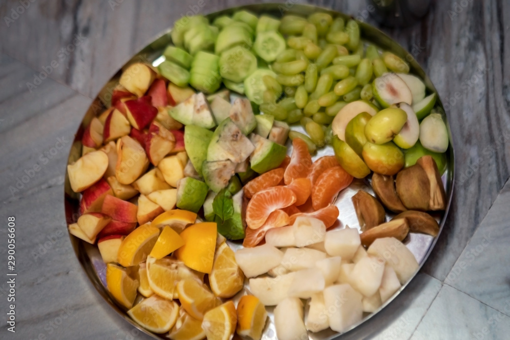 Tropical Fruits On A Plate or Thali. A plate or thali full of fruits ...