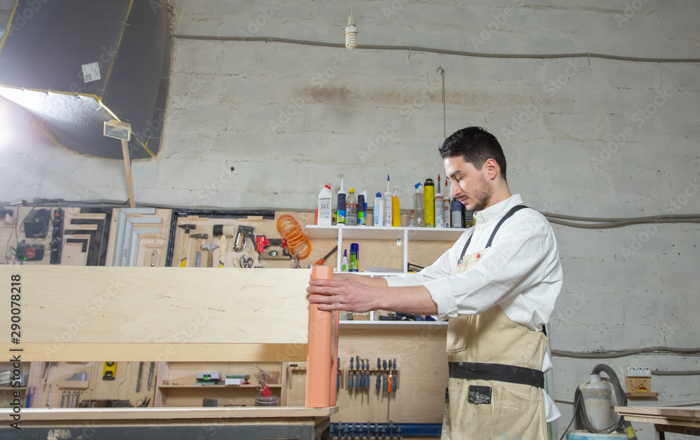 Small-Sized Companies, furniture and worker concept - Handsome young ...