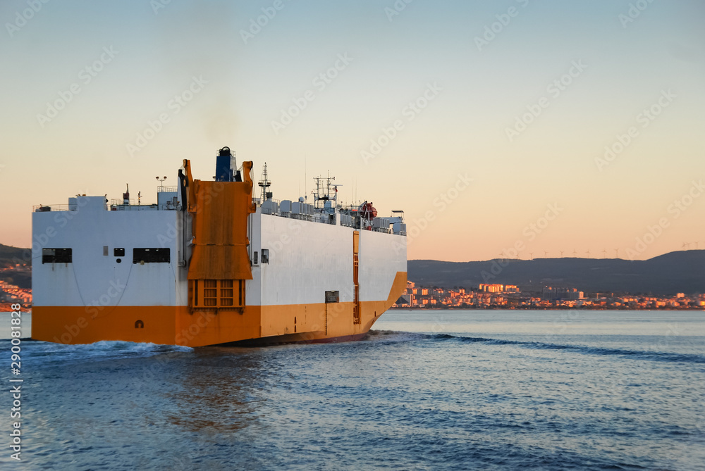 Large RORO ship or oceangoing vehicle carrier ship sailing in the sea ...