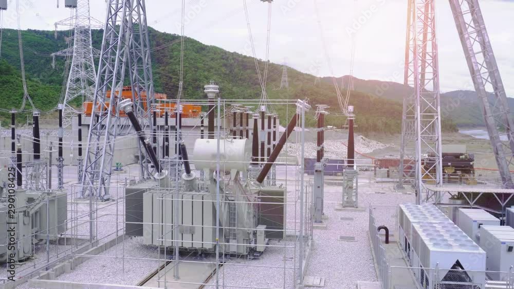 High voltage transformer at the hydroelectric dam.Large power ...