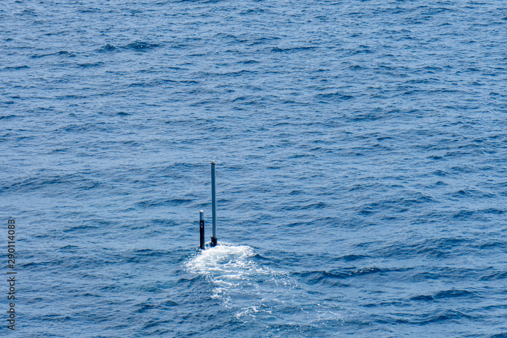 Real periscope and radio transmission mast of the attack submarine ...