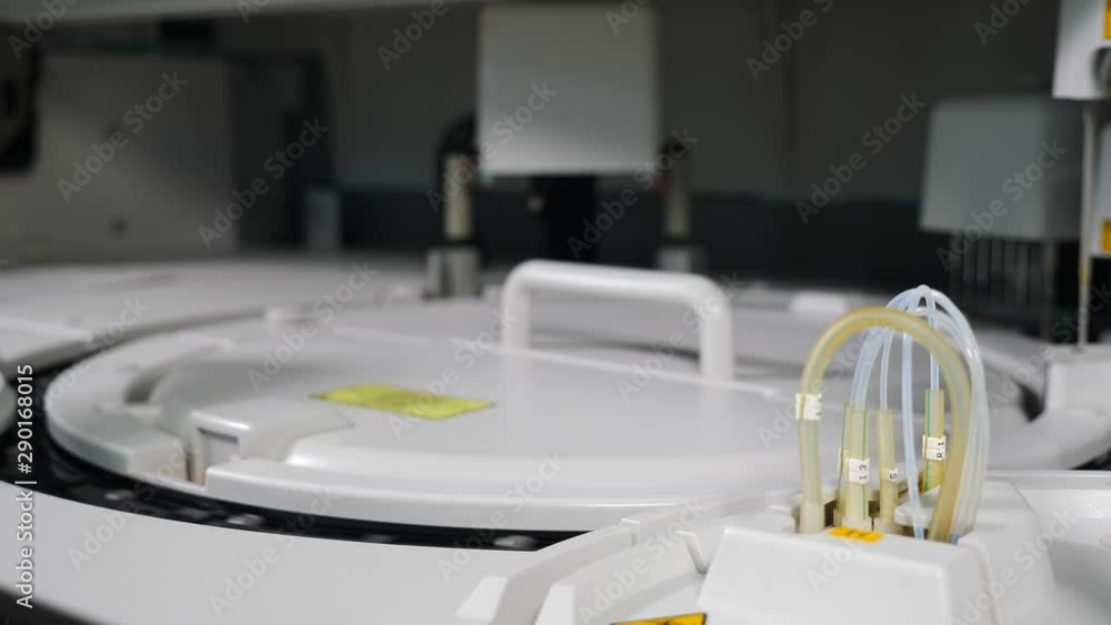 Modern laboratory machine automatically checks blood samples at ...